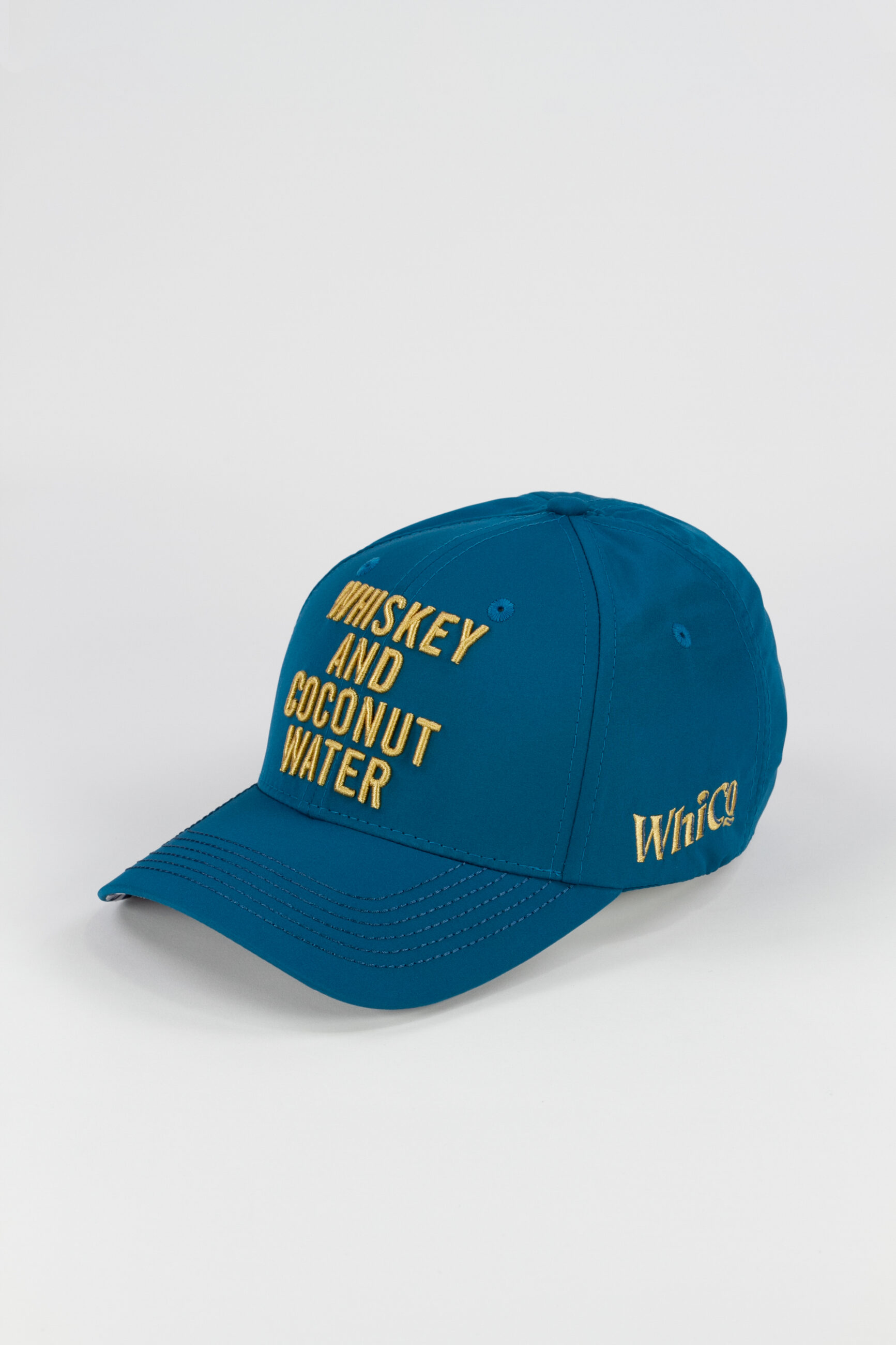 Petrol Blue & Gold Whiskey and Coconut Water Cap | WhiCo